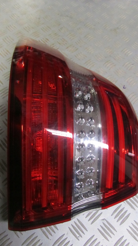 LAMPA TYLNA LEWA MERCEDES W166 ML/GLE A1669063301 - 7724428222 ...